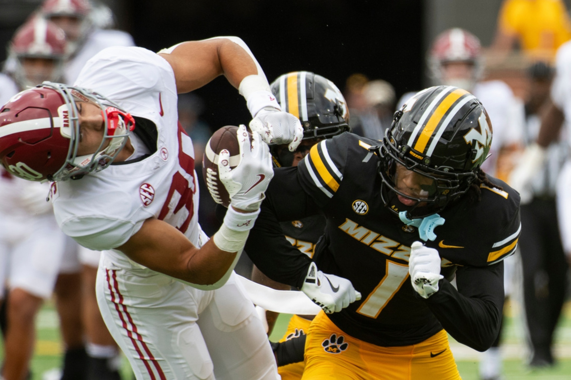 Chaos at Faurot Field: Alabama rising star knocked cold in brutal ...